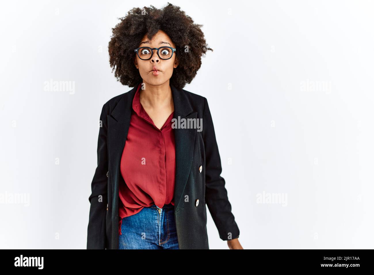 African american woman with afro hair wearing business jacket and ...