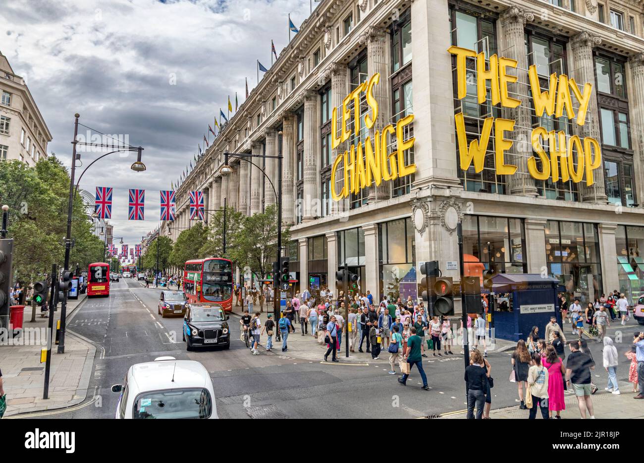 'Let's change the way we shop sign' on the side of Selfridge's department store, part of Project ...
