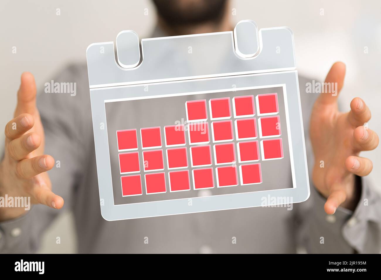 A man holding a floating 3D-rendered calendar icon Stock Photo - Alamy