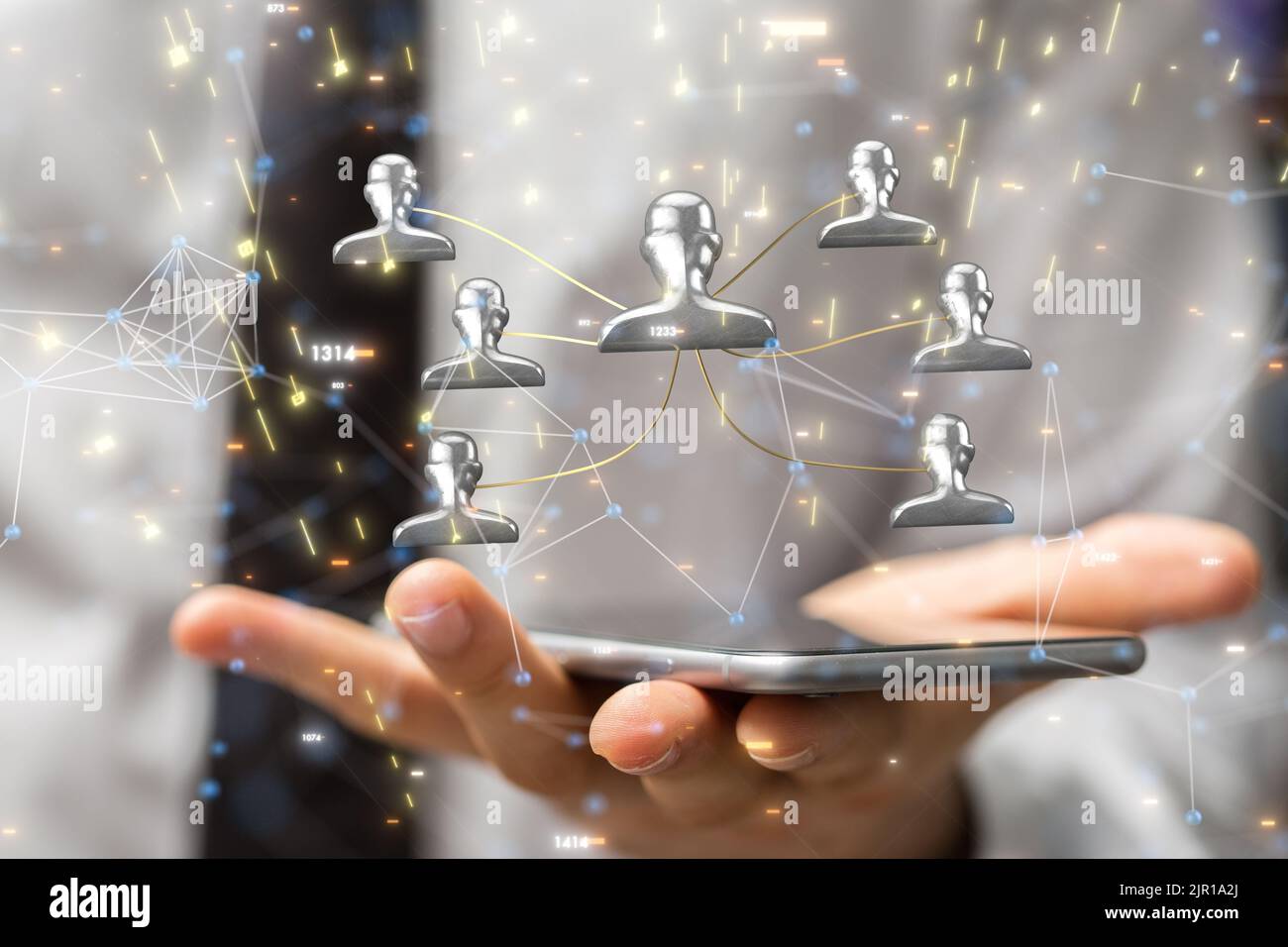 A man holding a phone with a floating 3D-rendered human icons Stock ...