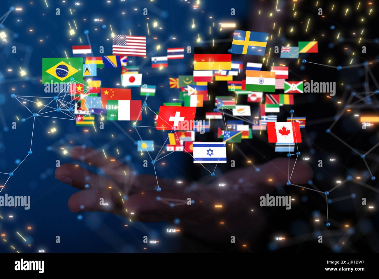 A man holding a floating 3D-rendered country flags Stock Photo - Alamy