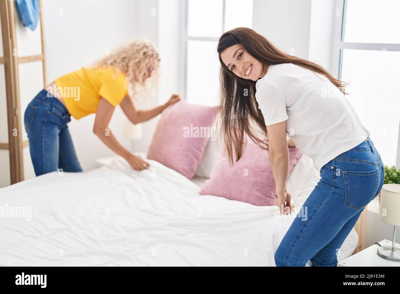 Mature women making bed hi-res stock photography and images - Alamy