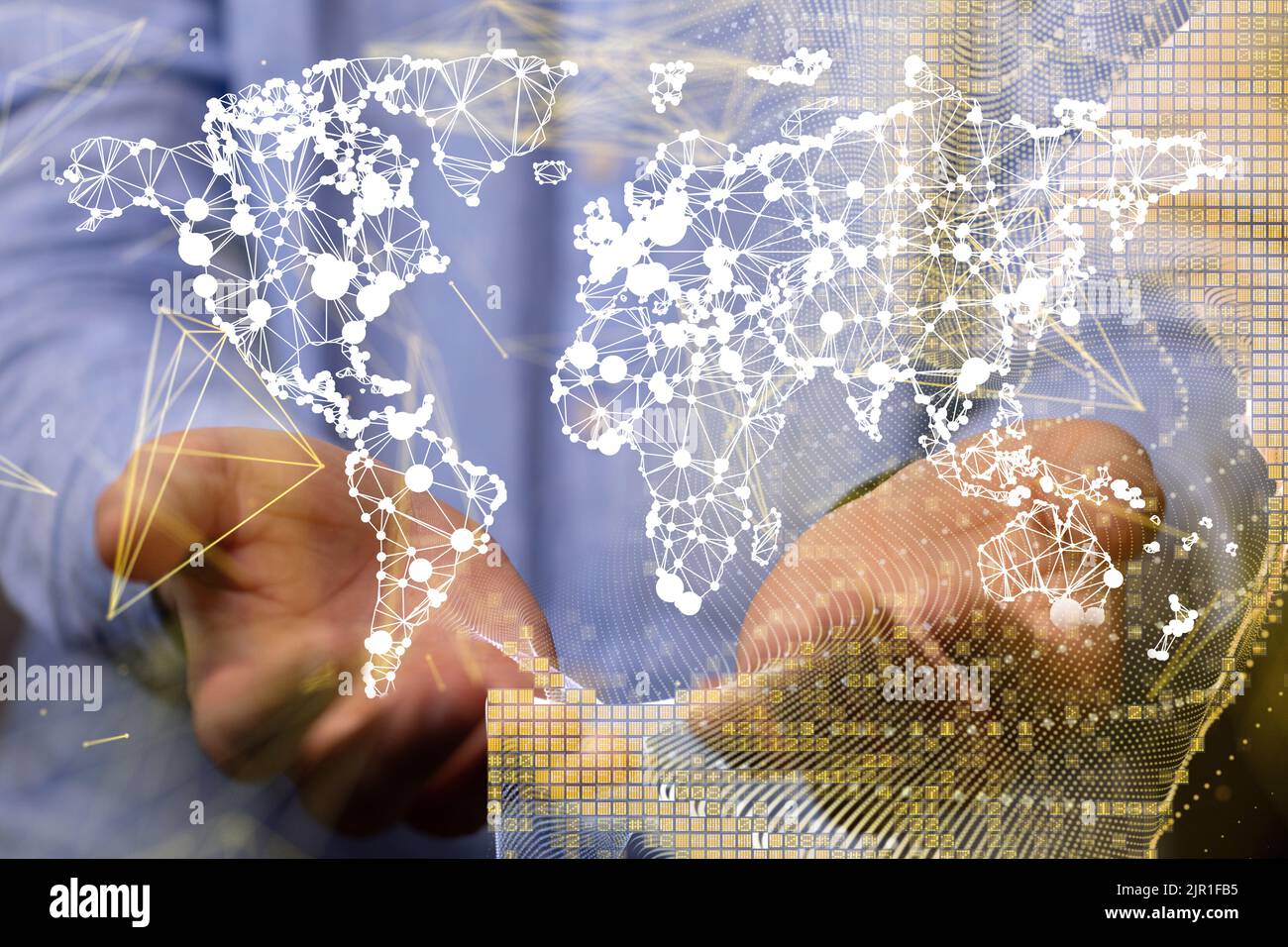 A male demonstrating a digital model of the globe's map with his hands ...