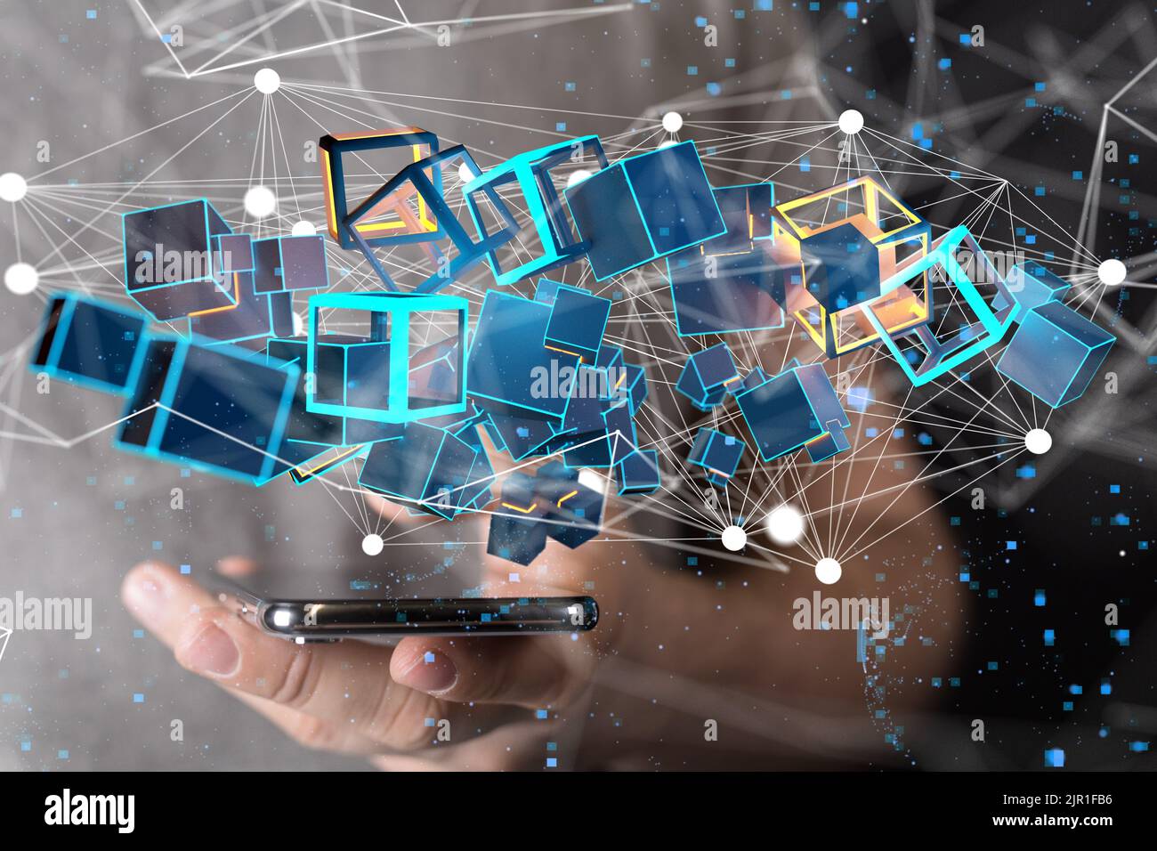 A male demonstrating 3D rendered digital pieces with his smartphone ...