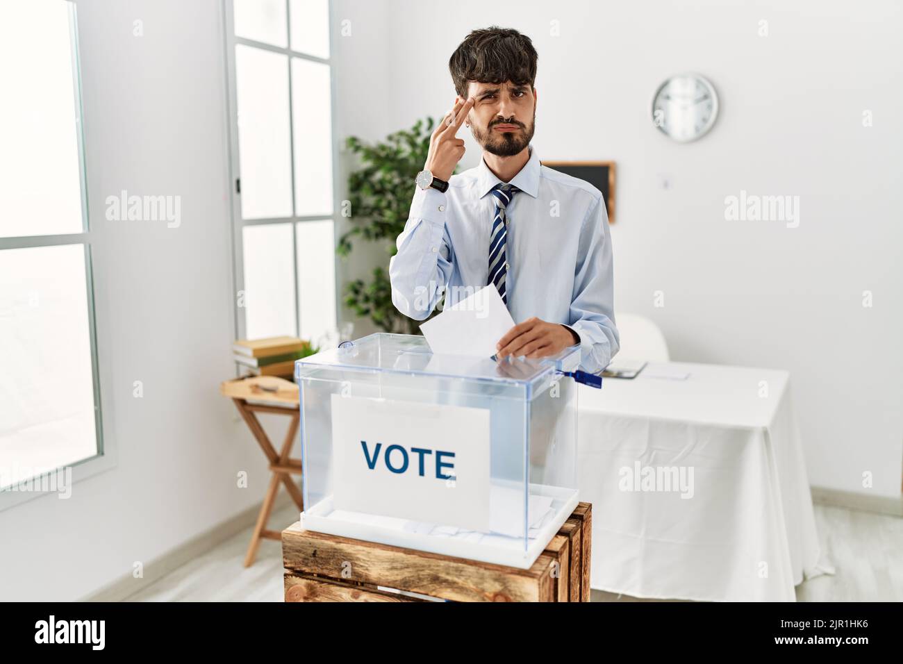 Voting man gun hi-res stock photography and images - Alamy