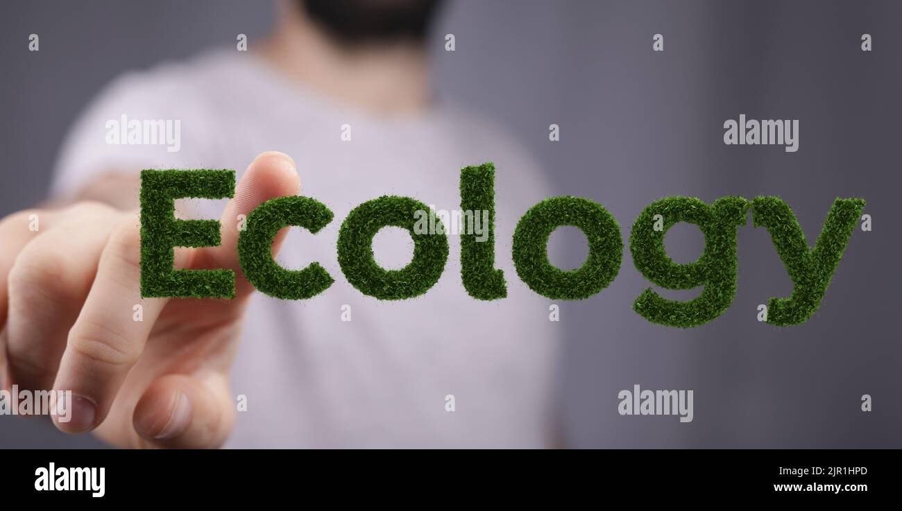 A man tapping a floating 3d-rendered "ecology" text, the concept of ...