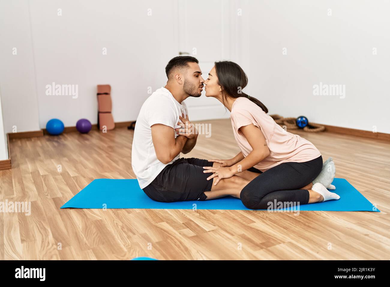 Young happy fitness couple kissing hi-res stock photography and images ...