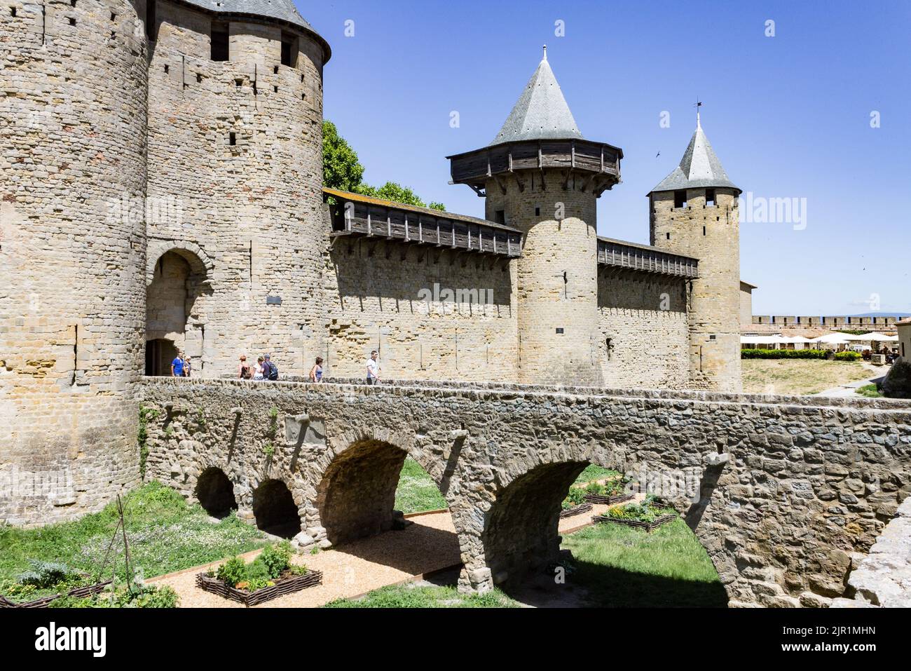 The towers of the medieval city and the historical buildings of ...