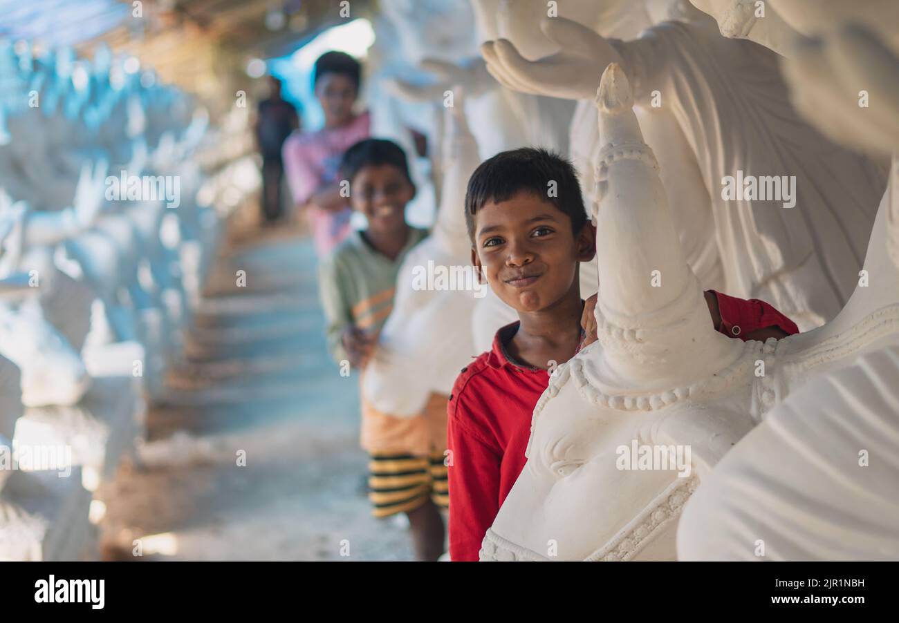 Pileru, India - July 28,2022: Kids posing next to ganesha idols.bull ...