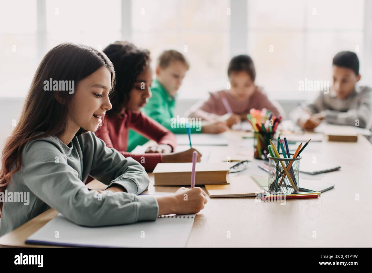 Students taking notes in classroom hi-res stock photography and images ...