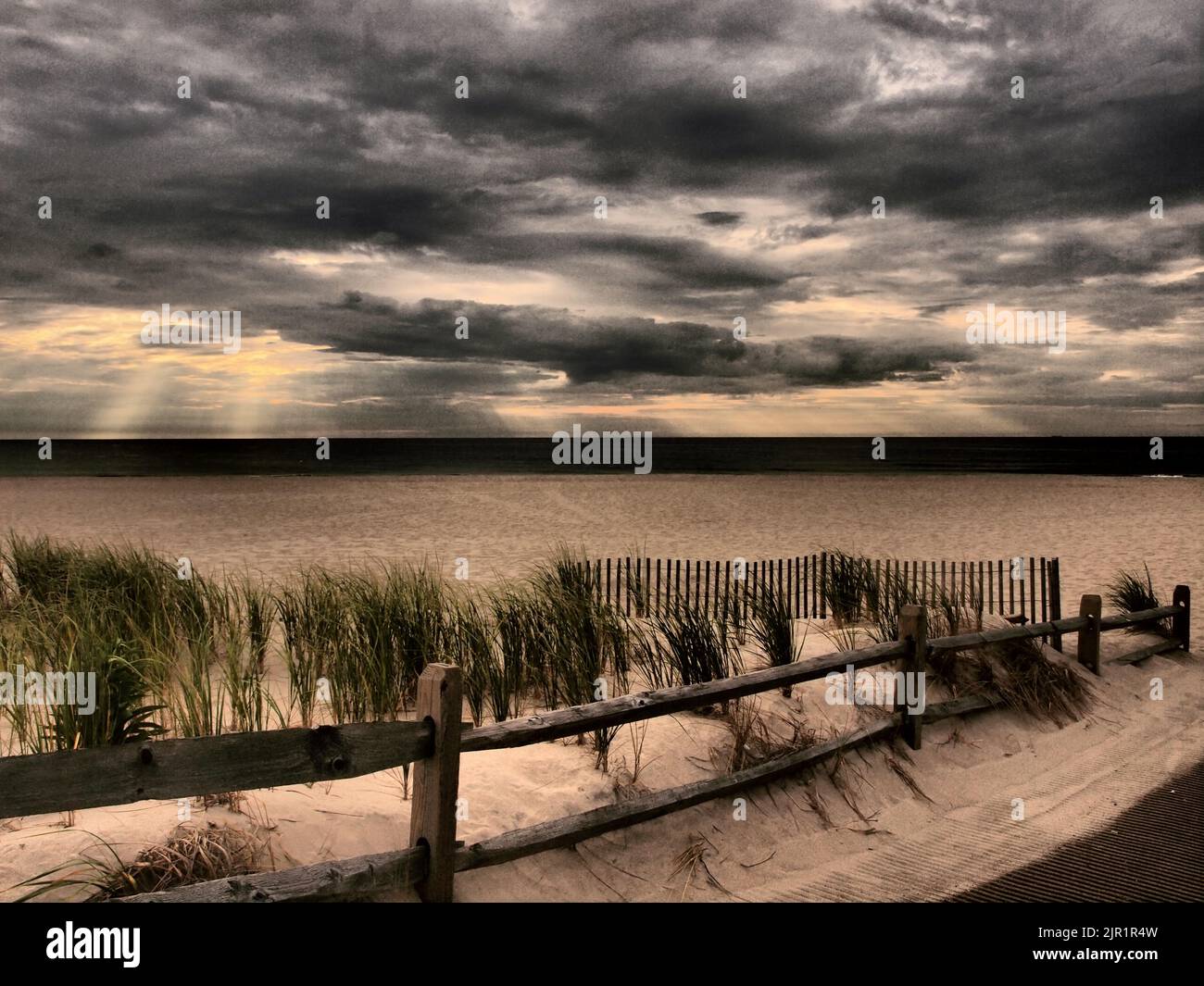 Dramatically lighted beach scenes with lifeboat hi-res stock ...