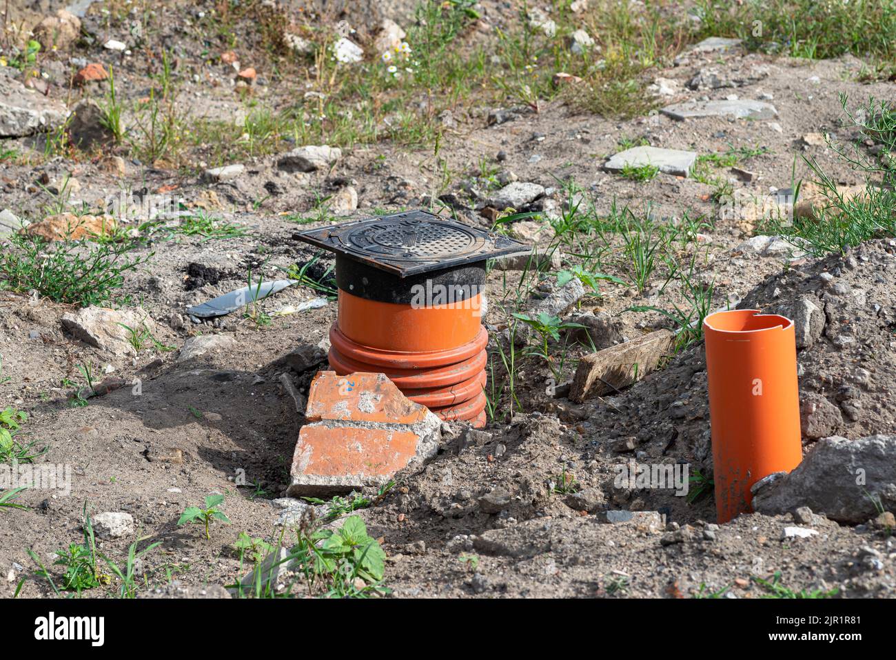 Inspection of the sewage system with a closed cast iron manhole ...