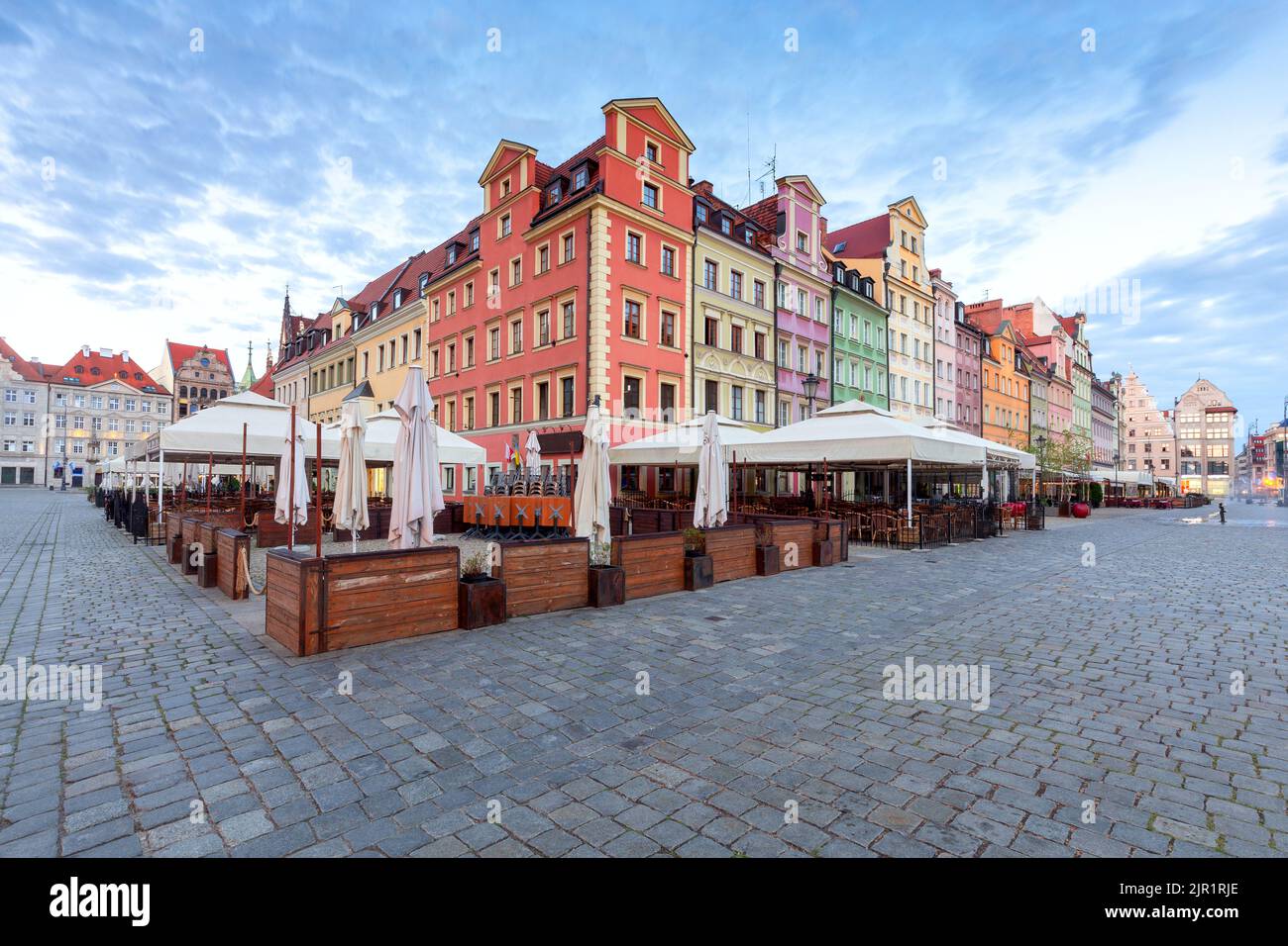 Multicolored facades of old medieval houses on the market square ...