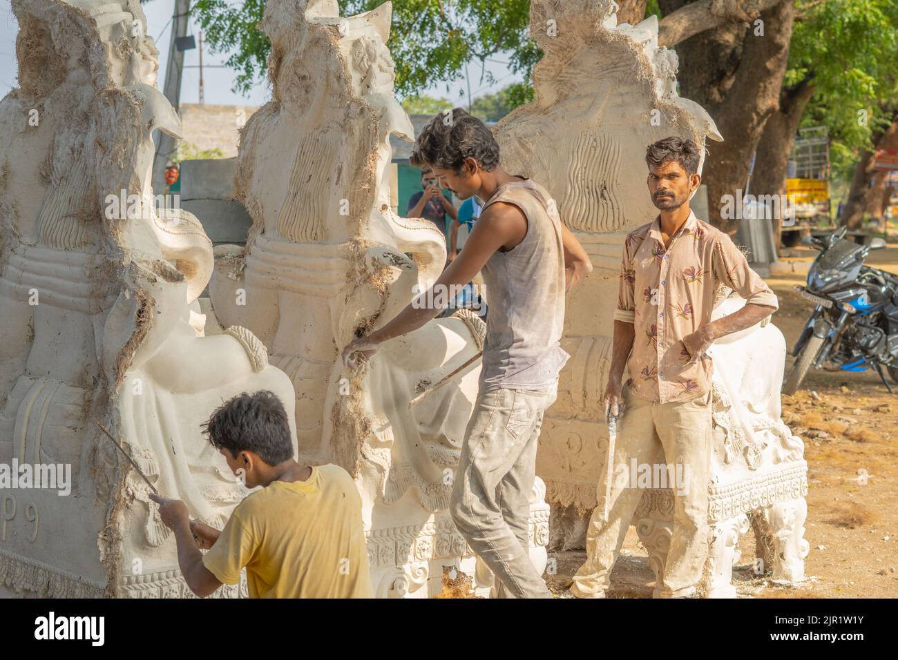 Pileru, India - July 28,2022: Young artisans carving lord Ganesha for ...