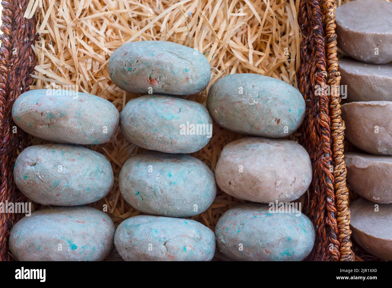 Stone soaps in the basket at craft street market stall Stock Photo - Alamy