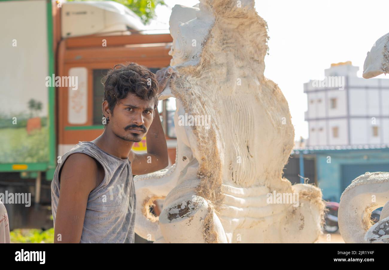 Pileru, India - July 28,2022: Young artisan posing for camera.Ganesha ...