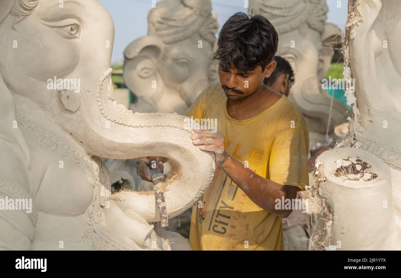 Pileru, India - July 28,2022: Young artisan finishing the artwork of ...