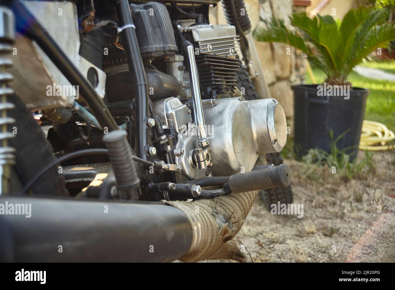 Detail of the complete mechanics of the engine of an old street bike ...