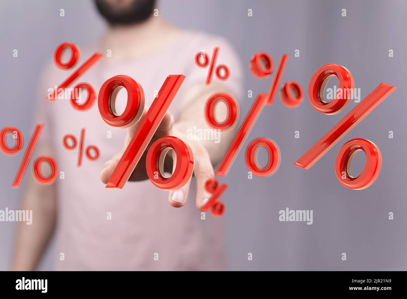A male's hand touching floating 3D percentage signs Stock Photo - Alamy
