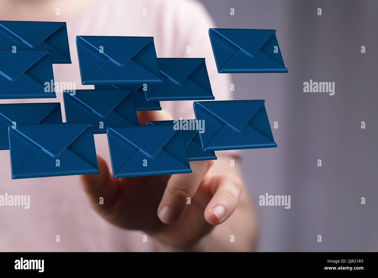 A finger touching a 3d rendering of floating connected blue message icons Stock Photo - Alamy
