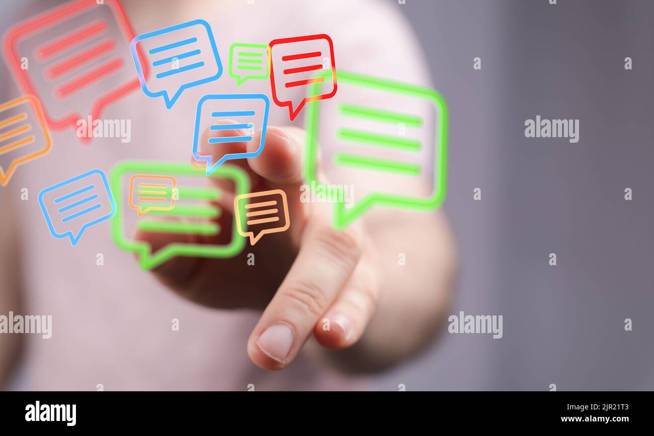 A finger touching a 3d rendering of floating connected message icons Stock Photo - Alamy