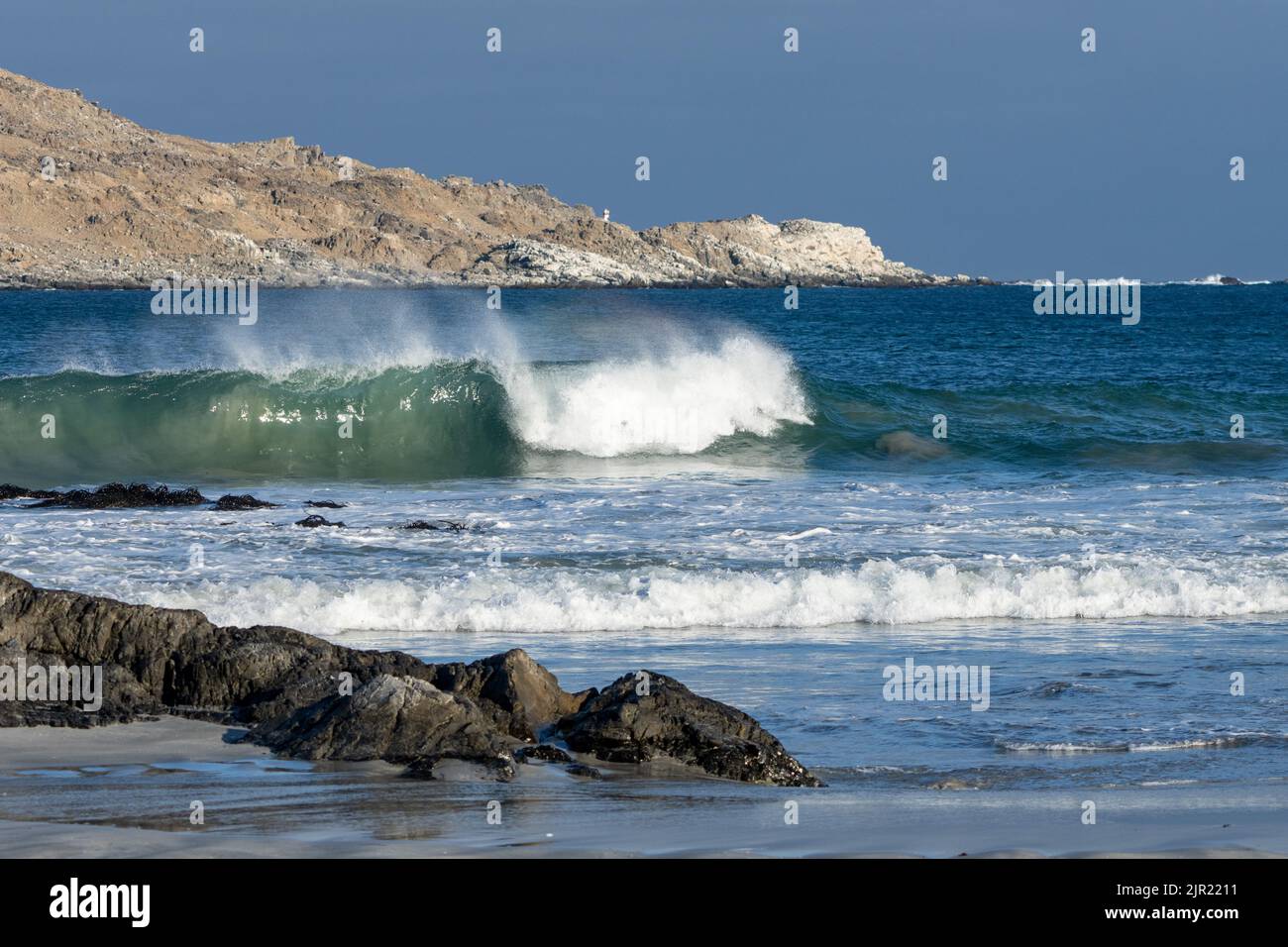 Waves break on the shore of the Pacific Ocean at Pan de Azucar National ...