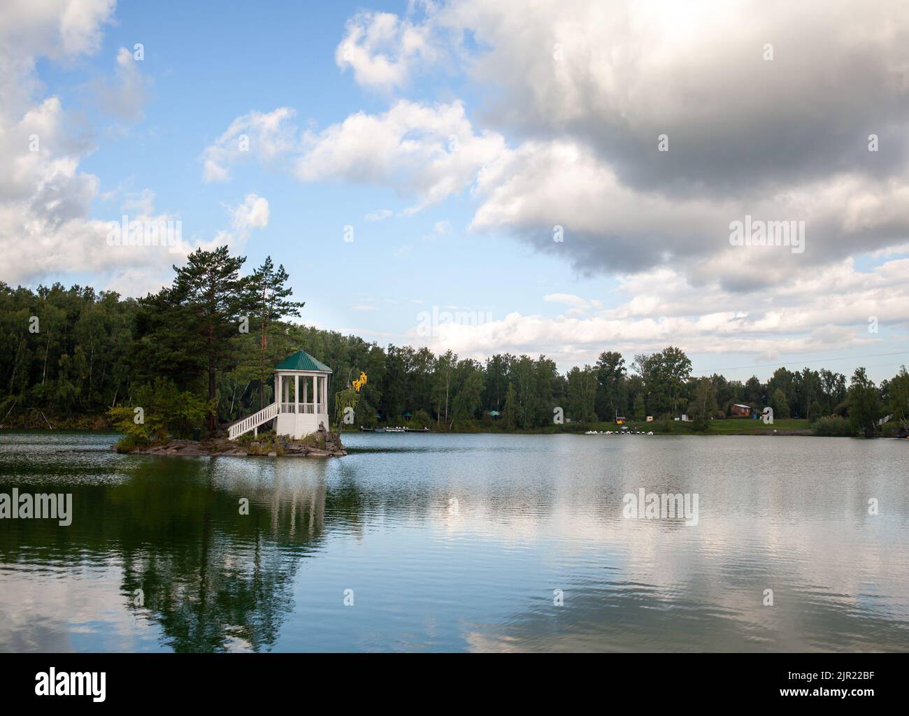 A small beautiful island on Lake Aya in the Altai Territory Stock Photo ...