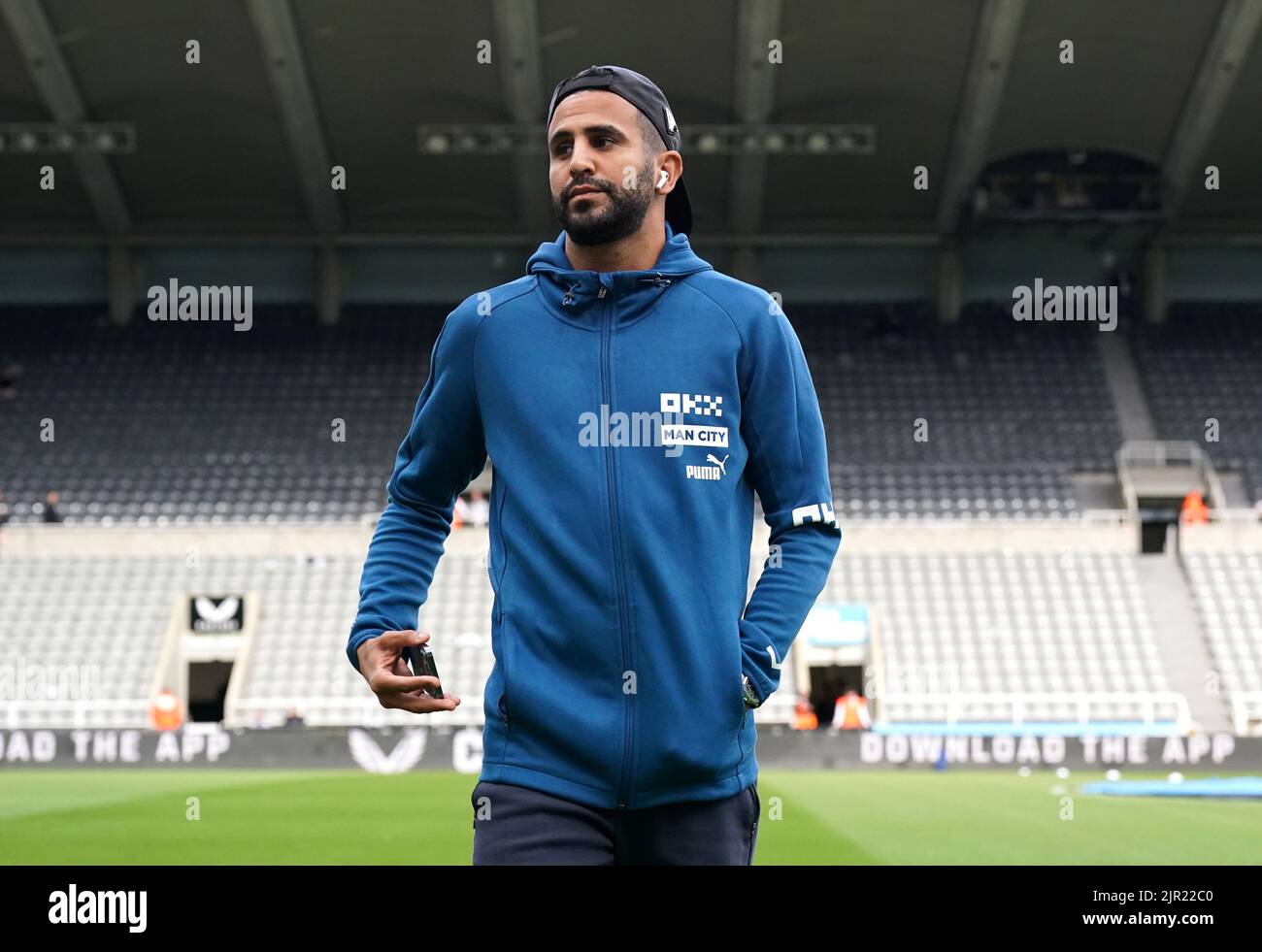 Manchester City's Riyad Mahrez inspects the pitch before the Premier ...