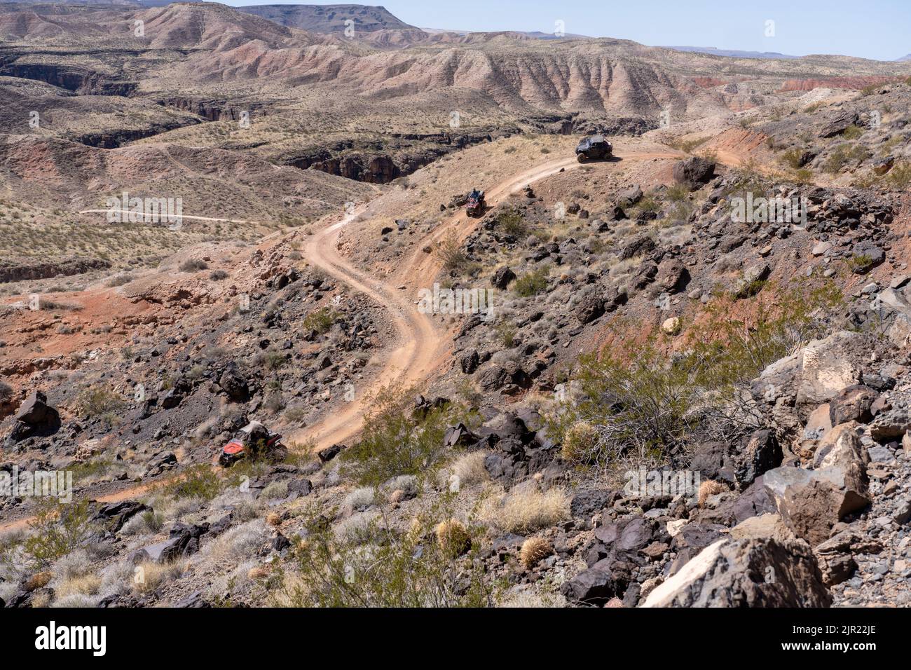 Four-wheel drive OHVs or off-highway vehicles on a trail ride through ...