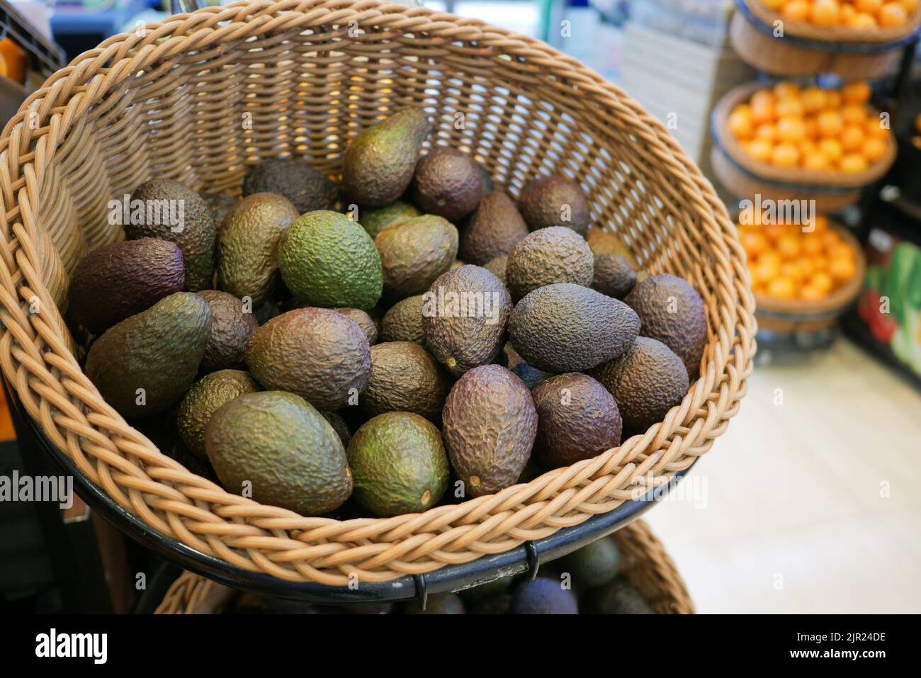 many avocado display for sale at local store Stock Photo - Alamy
