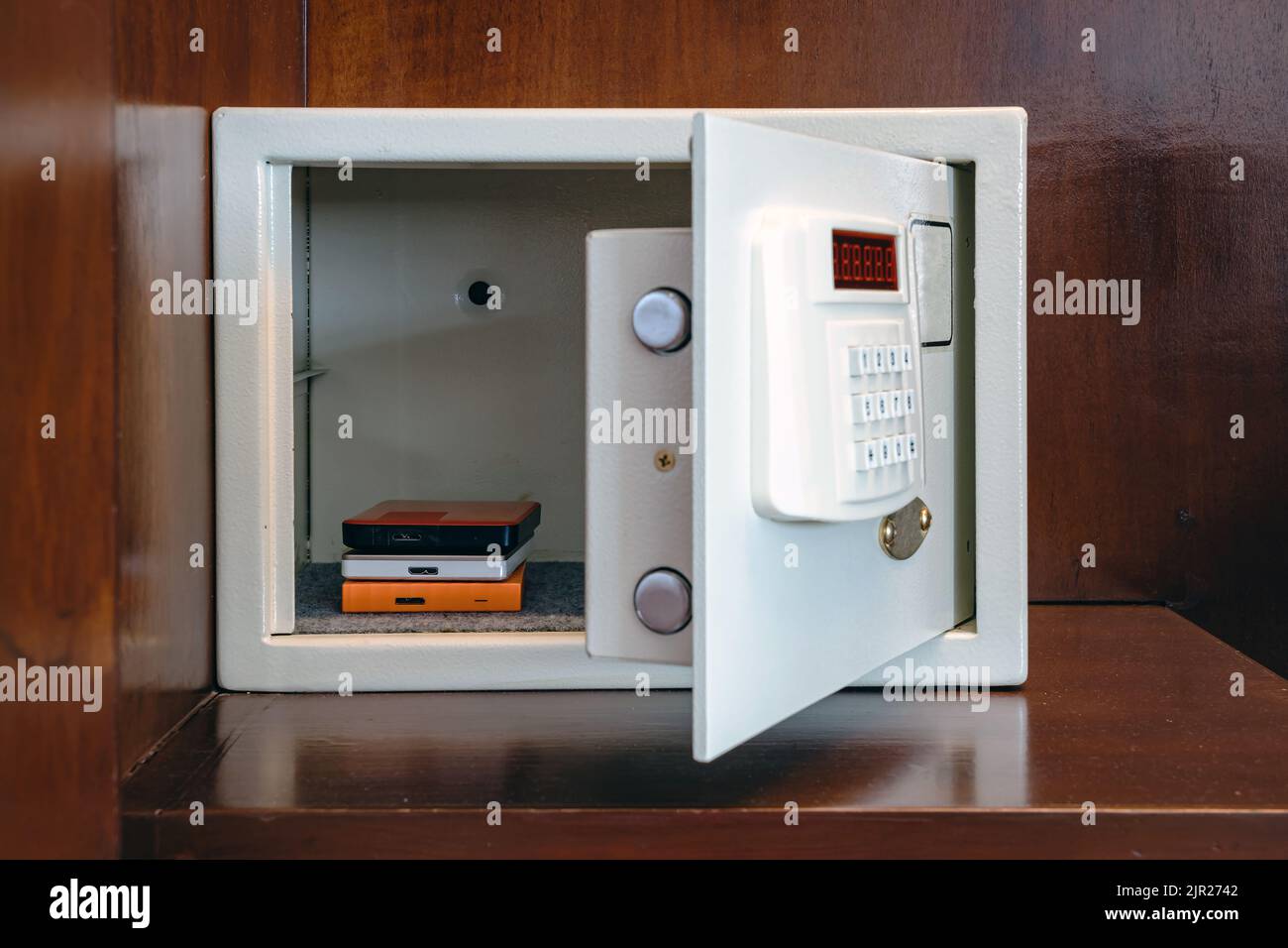 Security external hard drive in open metal safe. External hard disk ...