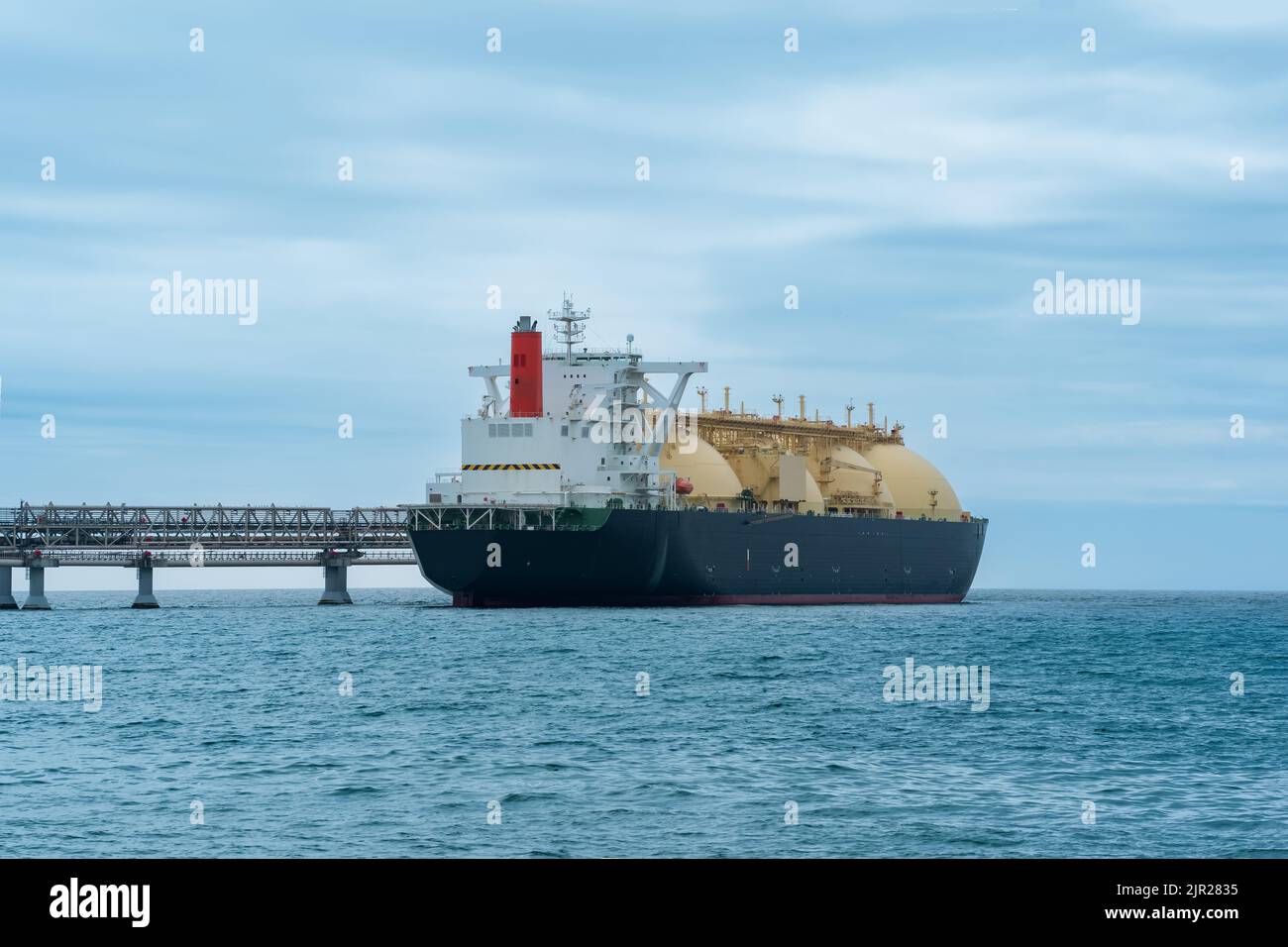 liquefied natural gas tanker vessel during loading at an LNG offshore terminal Stock Photo - Alamy