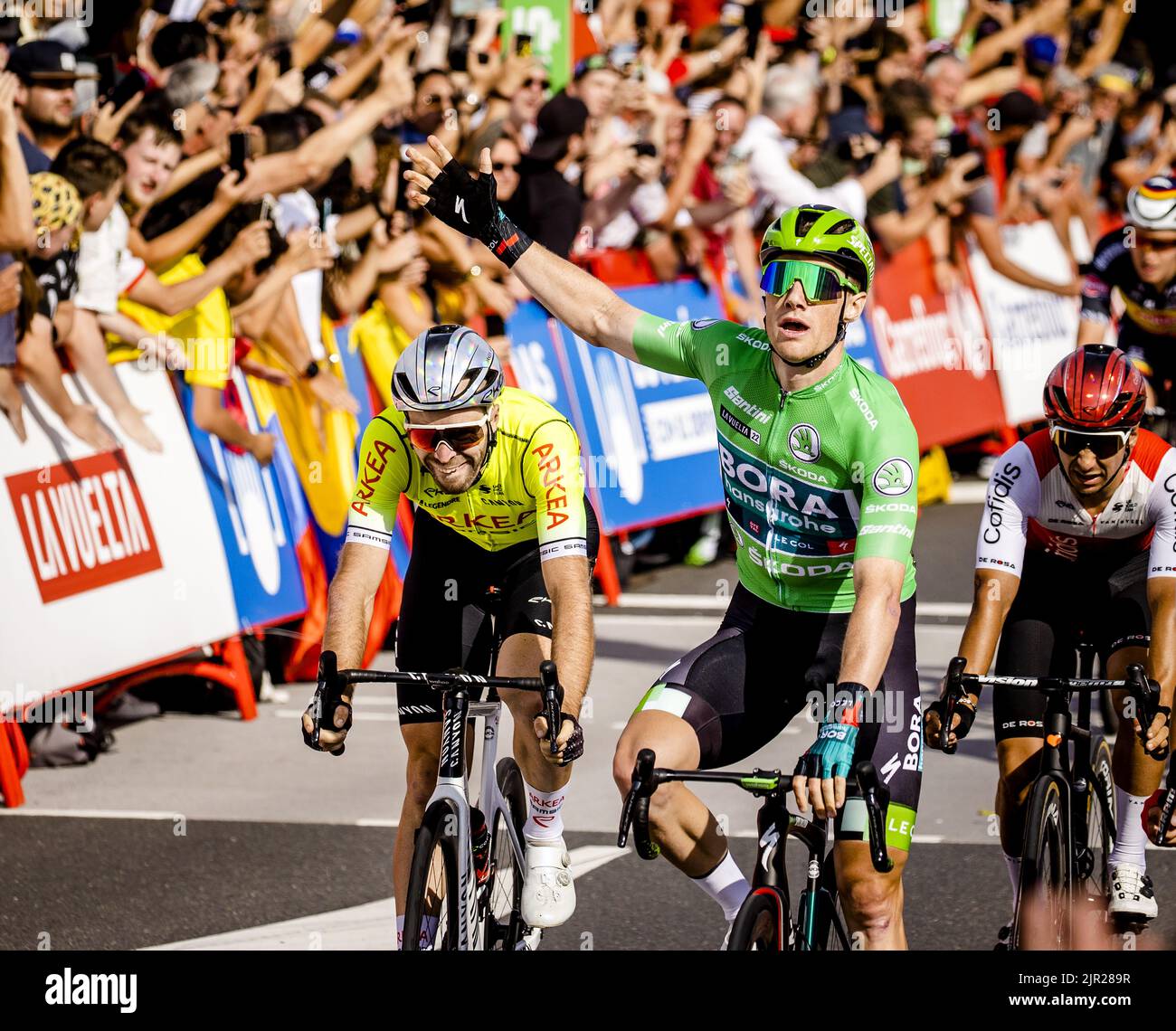 BREDA - Sam Bennett (Team Bora-Hansgrohe) crosses the finish line to ...