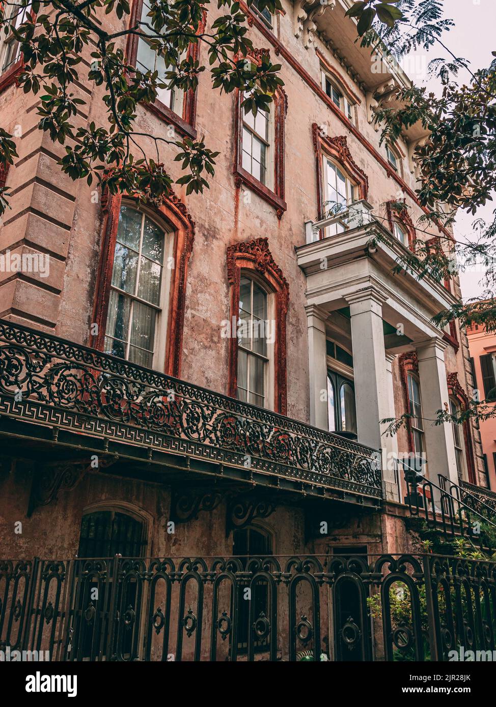 A vertical shot of an old building in the Savannah Historic District ...
