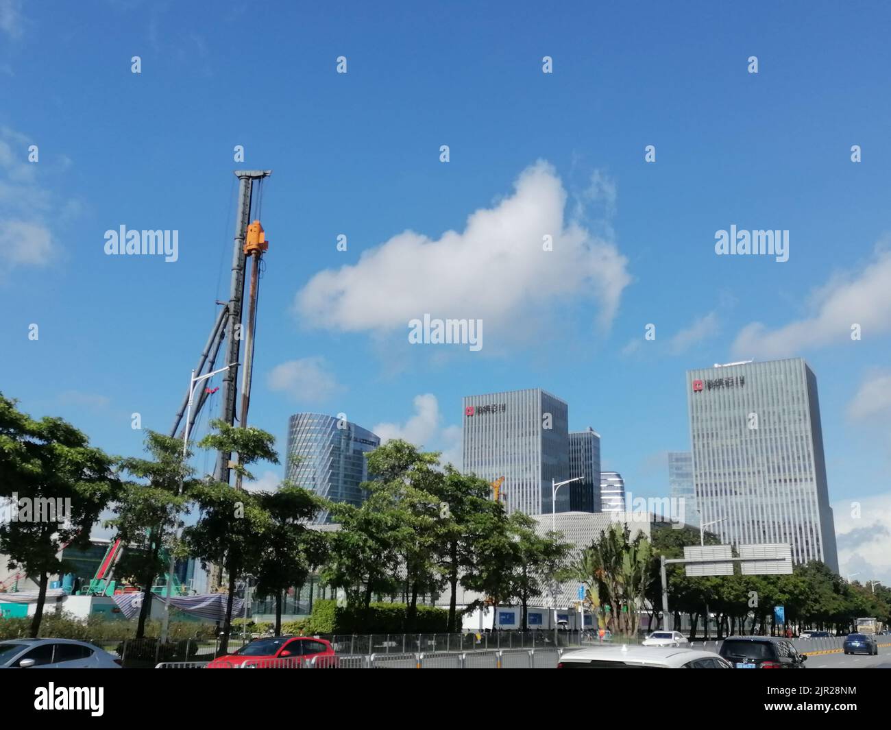 Shenzhen, China: road traffic and construction site landscape in Bao'an ...