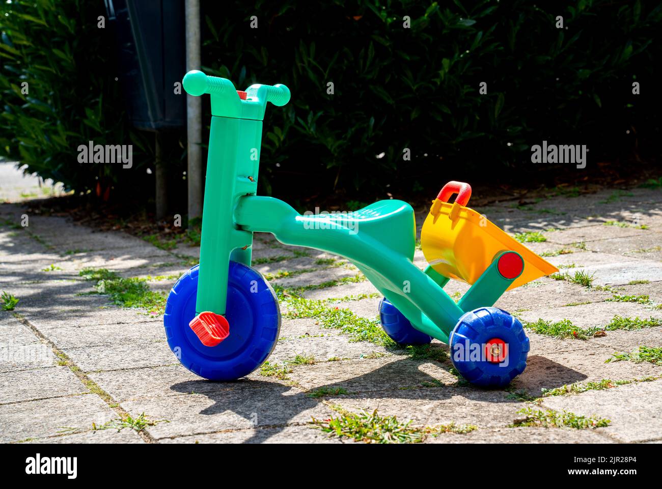 Children riding tricycles hi-res stock photography and images - Alamy