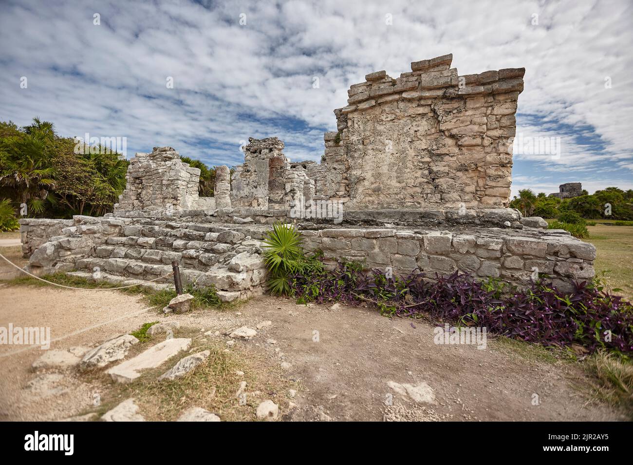 Side view of the remains of a small Mayan temple in the Tulum complex ...