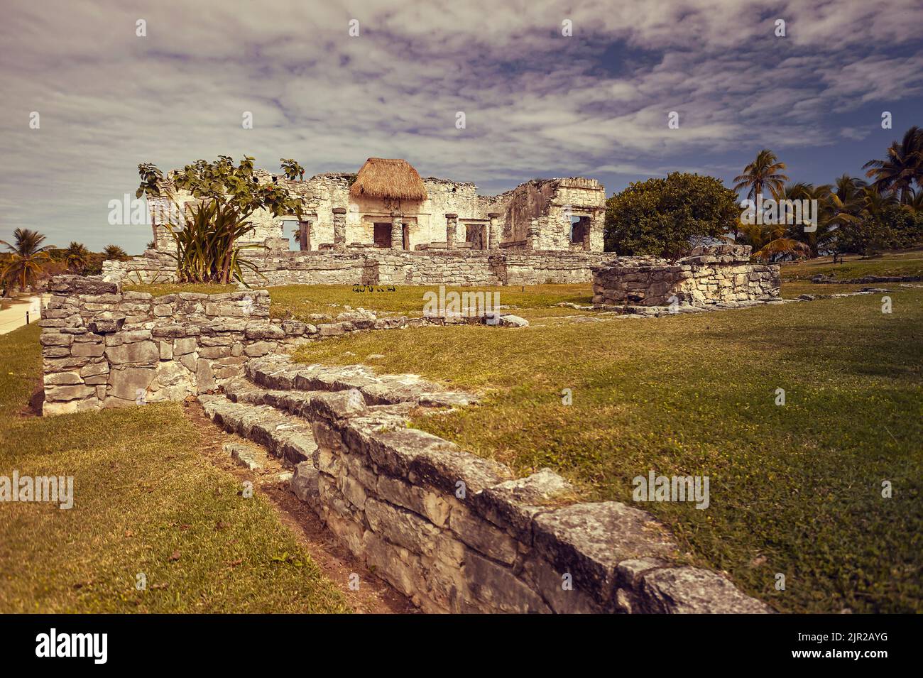 Side view of the remains of a small Mayan temple in the Tulum complex ...