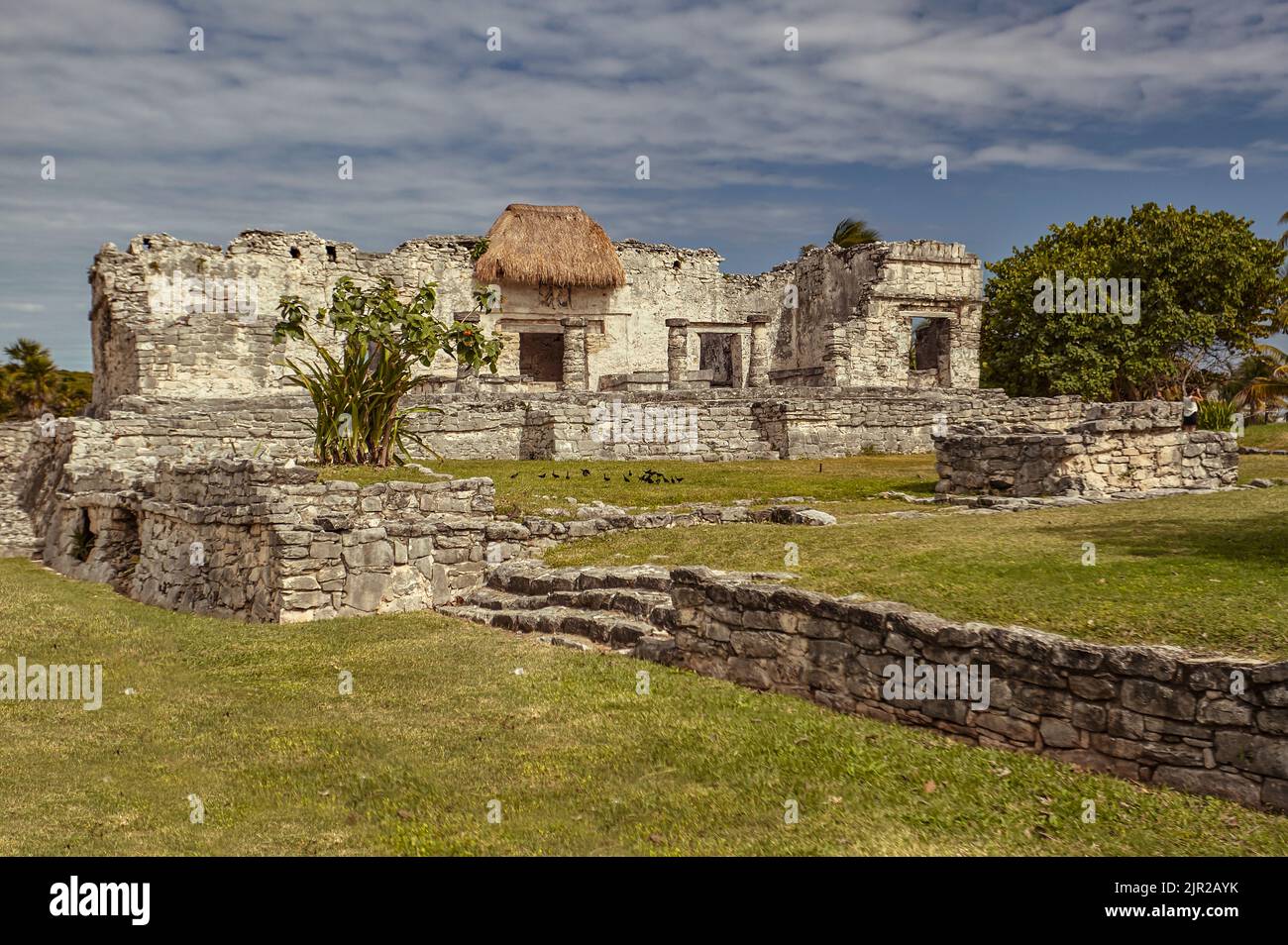 Side view of the remains of a small Mayan temple in the Tulum complex ...