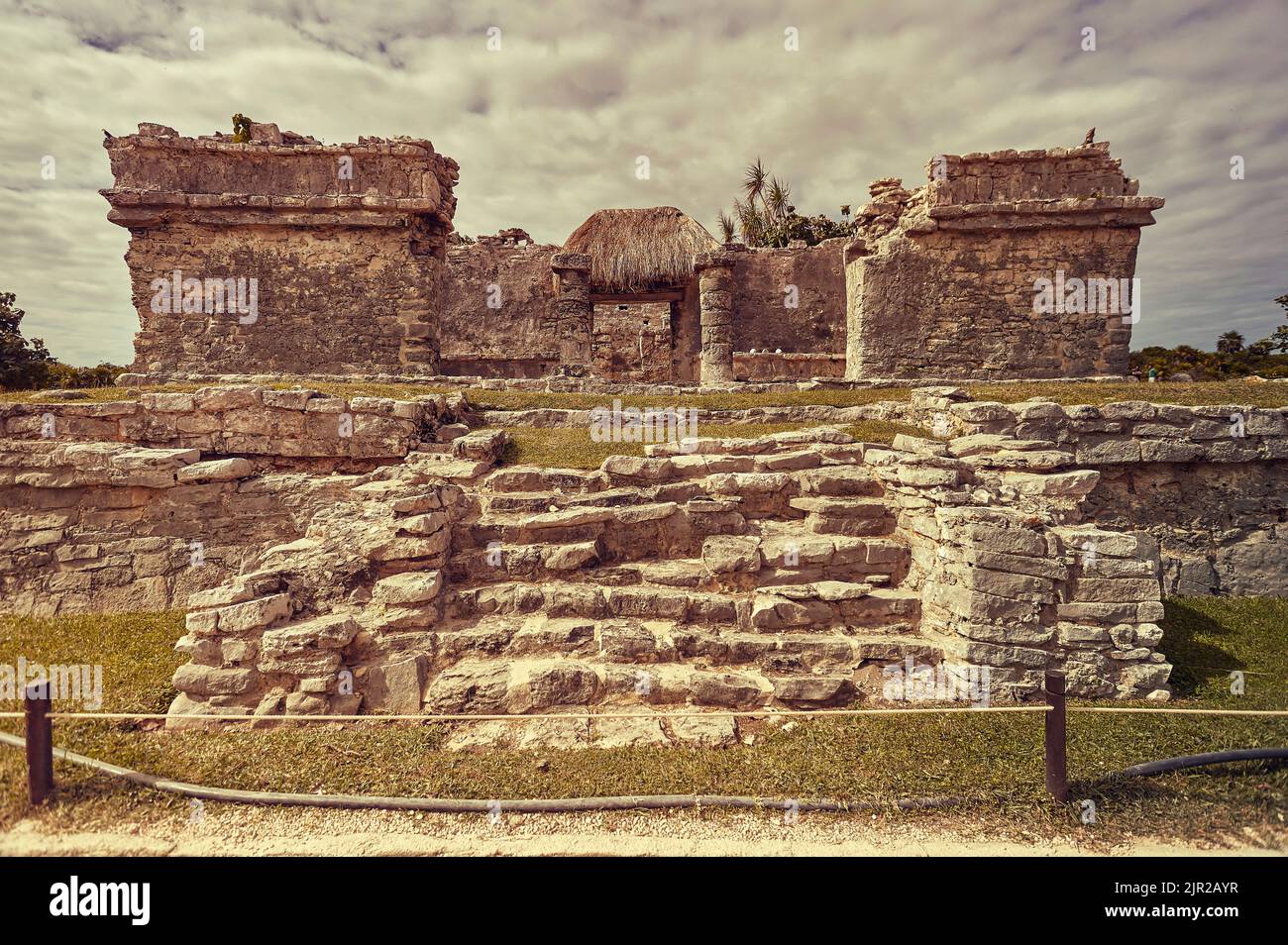 Front view of the remains of a small Mayan temple in the Tulum complex ...