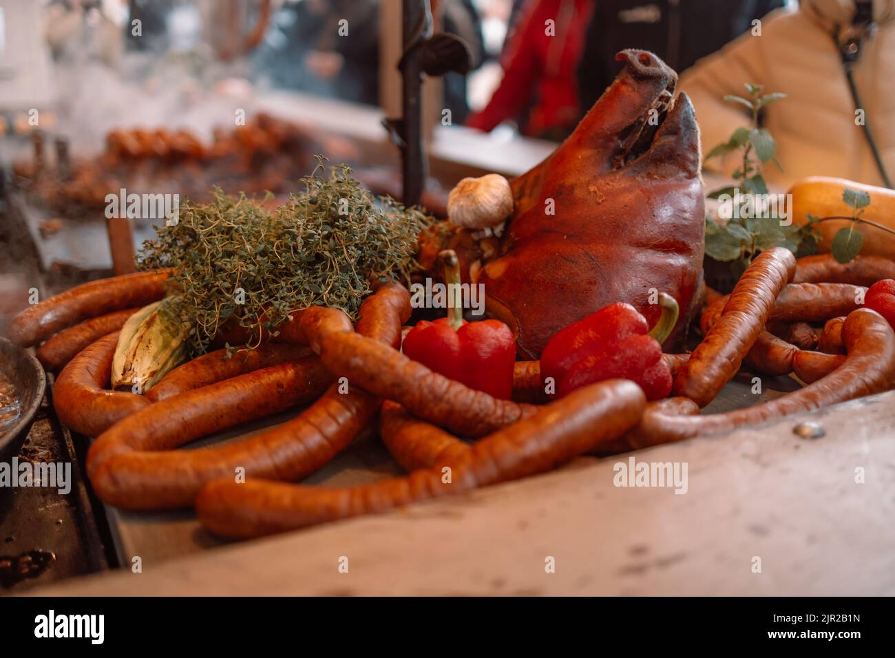 Fried baked sausages, hot dog on street food outdoor market stall in ...
