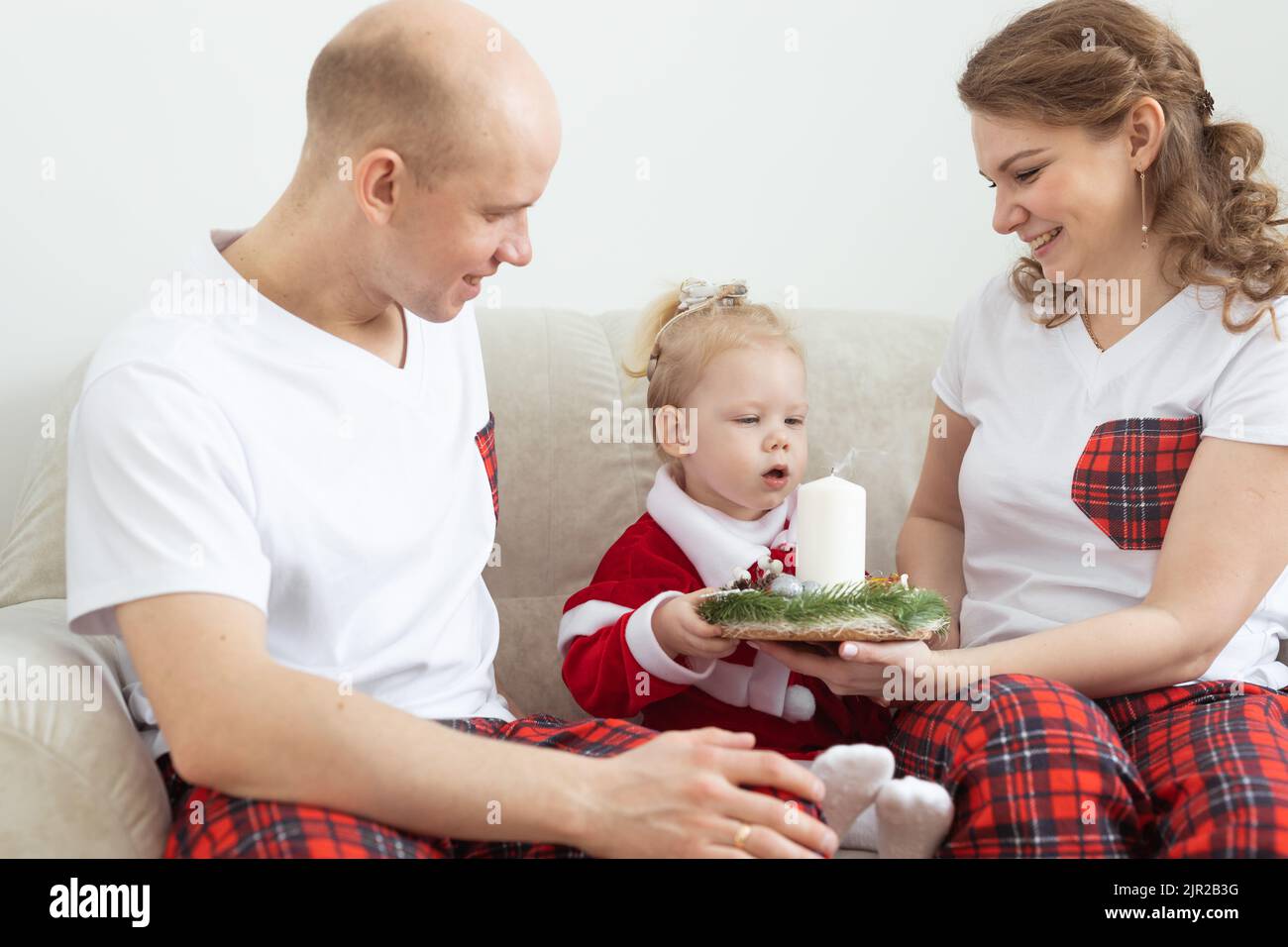 Baby child with hearing aid and cochlear implant having fun with ...