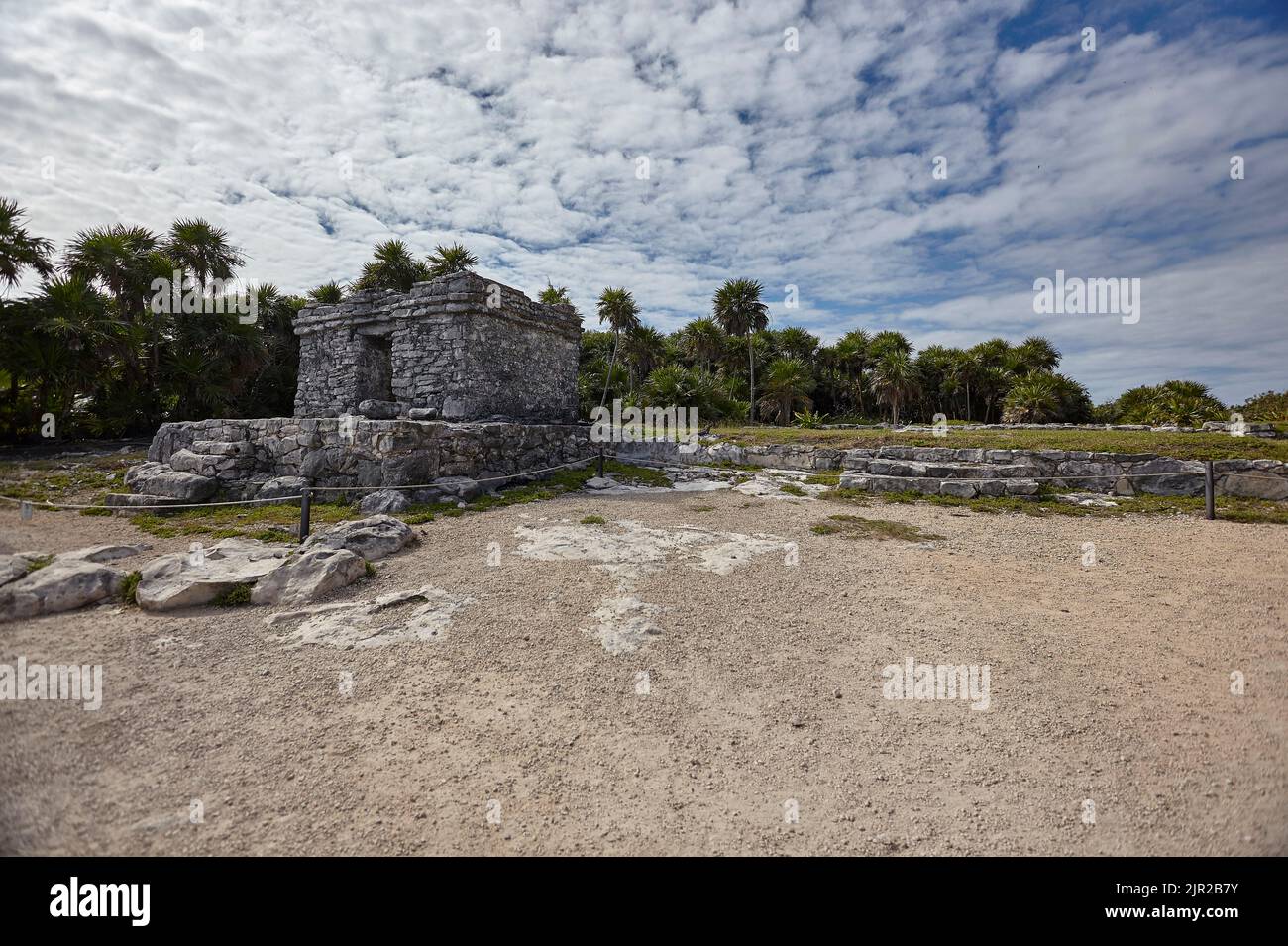 Side view of the remains of a small Mayan temple in the Tulum complex ...