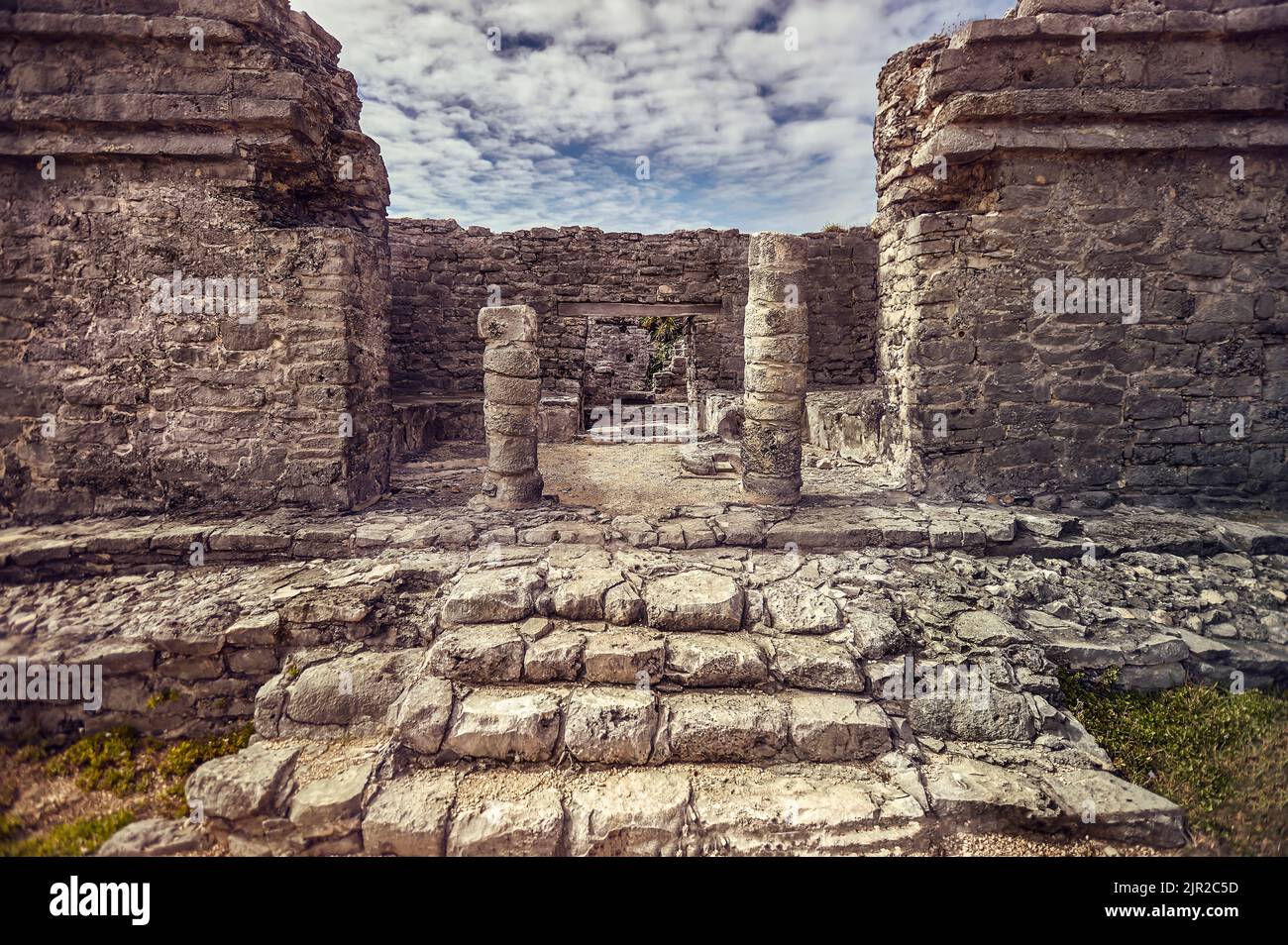 Detail of the columns of a Mayan temple of the tulum complex in mexico ...