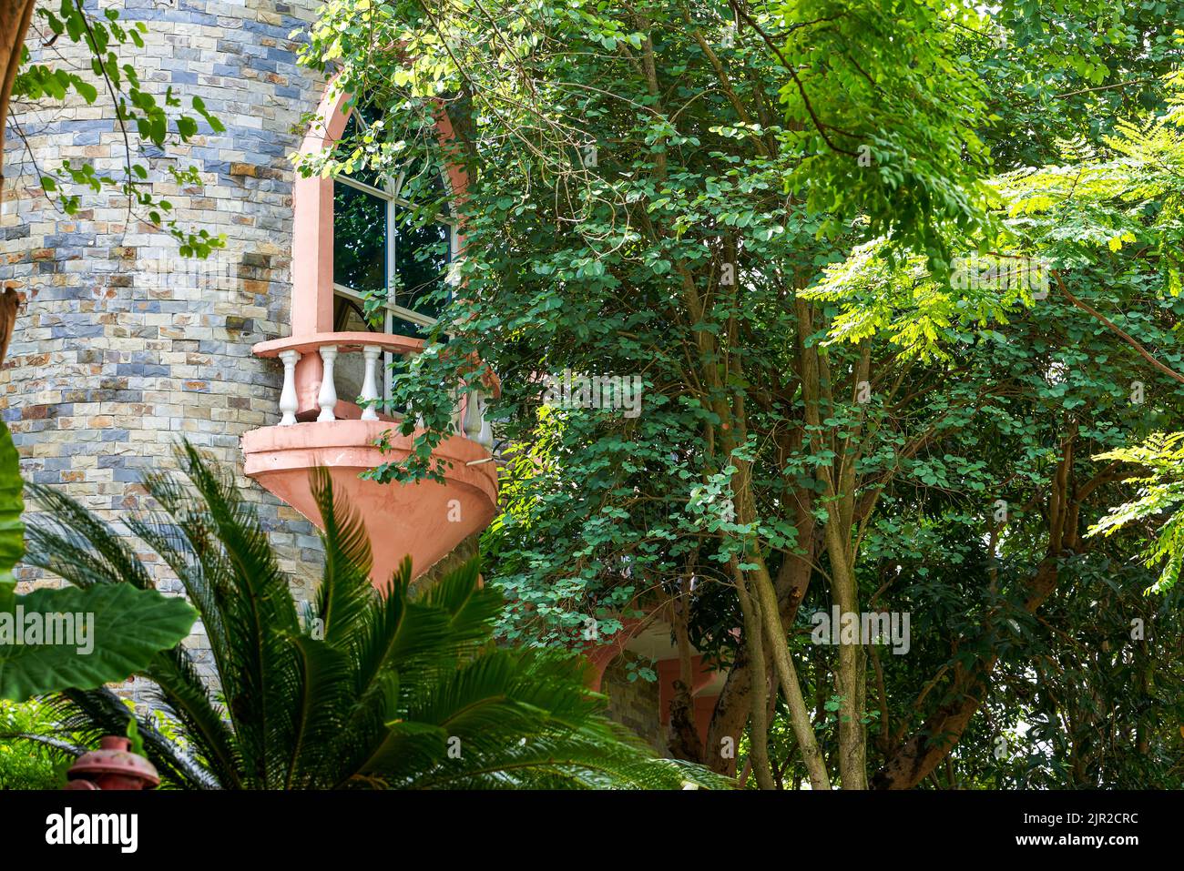 European style castle building in the forest in the park Stock Photo ...