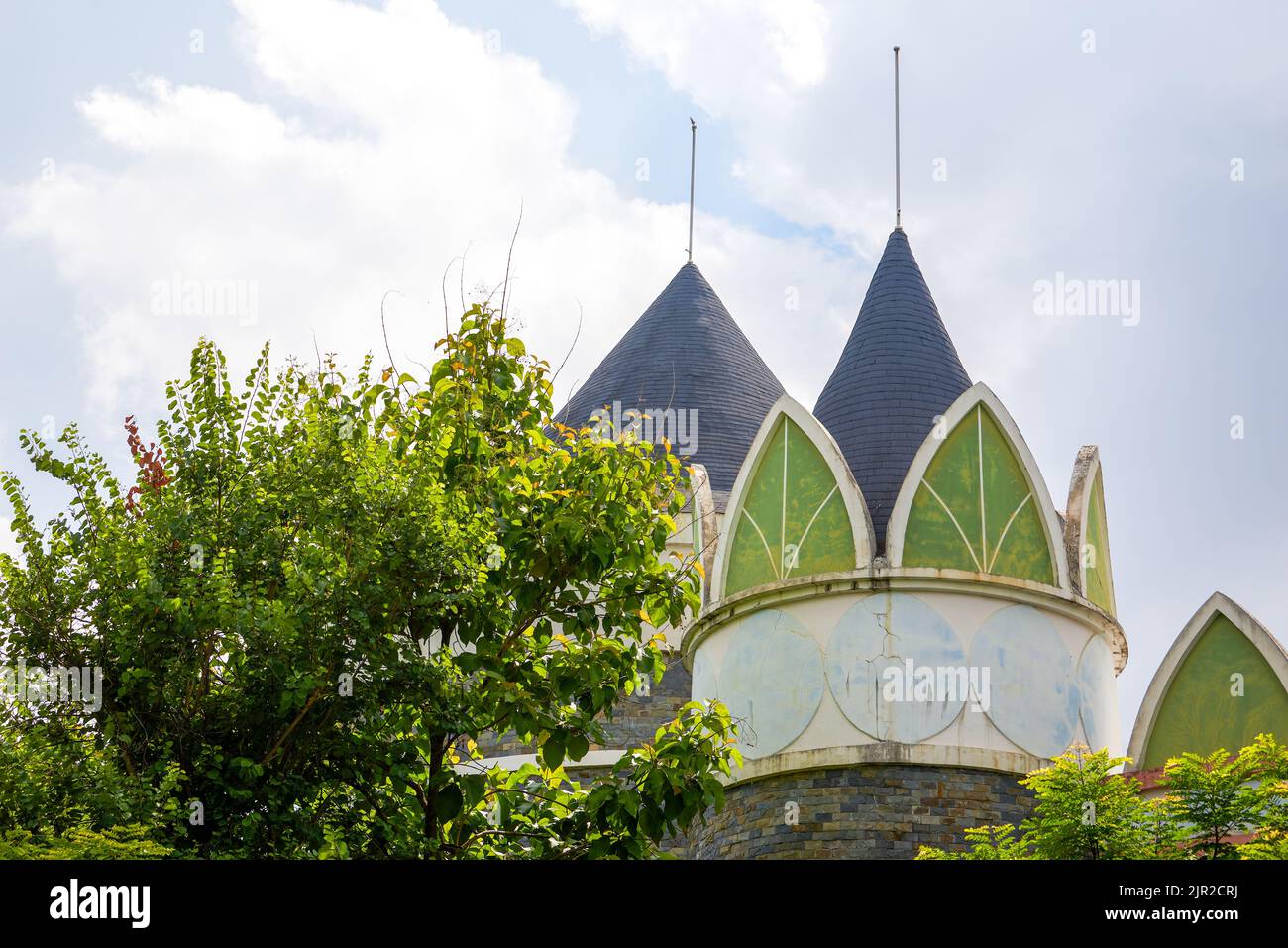 European style castle building in the forest in the park Stock Photo ...