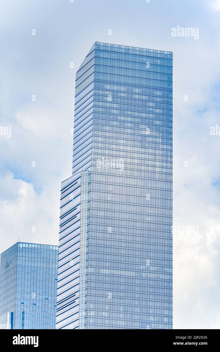 High-rise building with glass curtain wall in city business district ...
