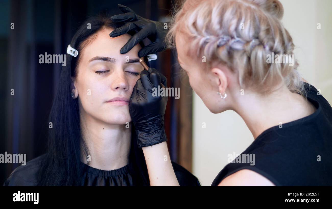 beauty saloon. Eyebrow correction. cosmetologist, browmaker, master in ...