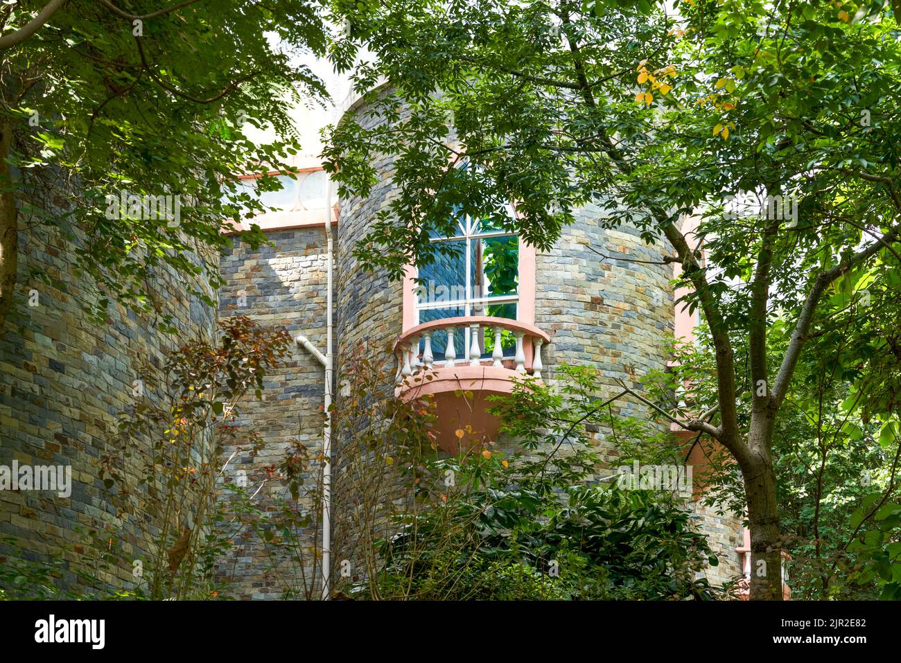 European style castle building in the forest in the park Stock Photo ...