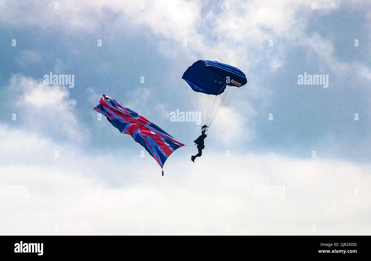 A member of the Tigers Army Parachute Display team flies the Union Jack ...